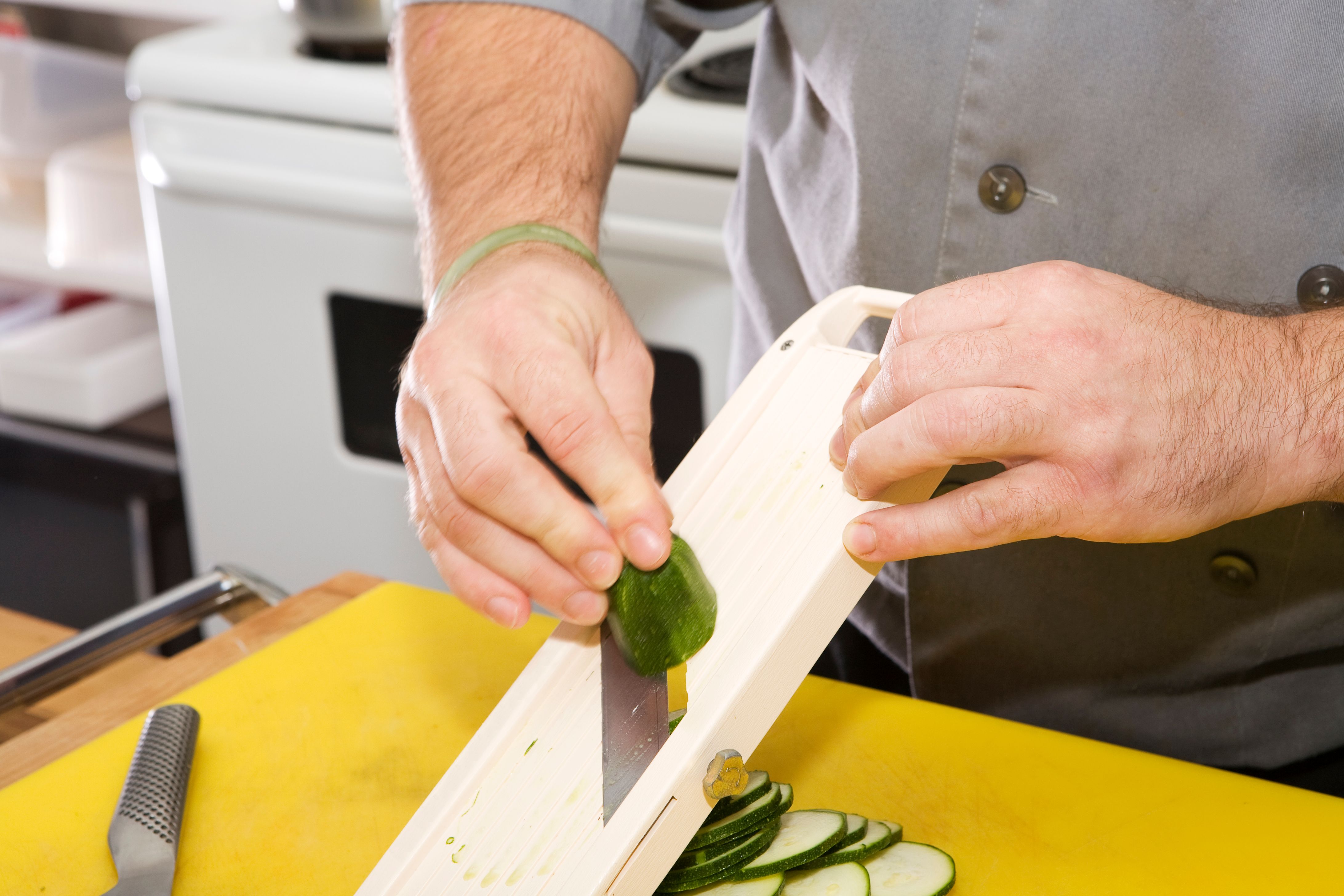 Mastering Precision: The Art of Using a Mandoline Slicer